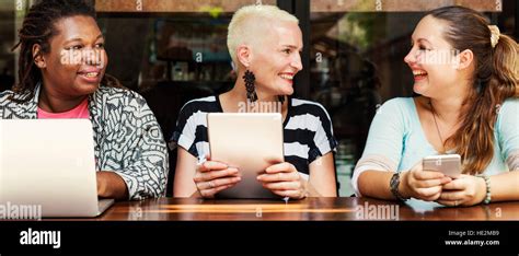 Women Using Digital Device Concept Stock Photo Alamy