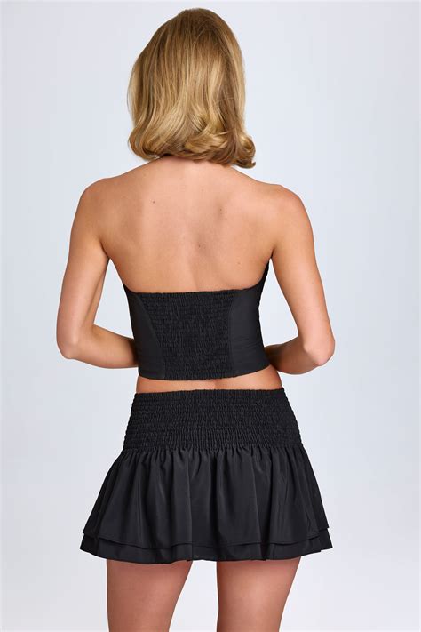 Nellary Ruffled Shirred Low Rise Micro Mini Skirt In Black Oh Polly