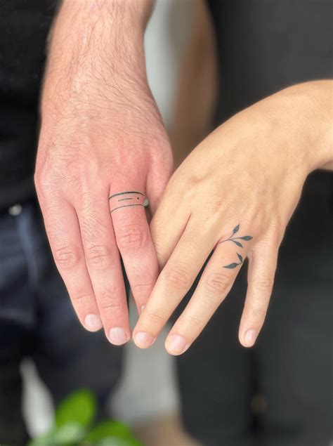 Best 13 41 Beautiful Wedding Ring Tattoos For Non Traditional Couples
