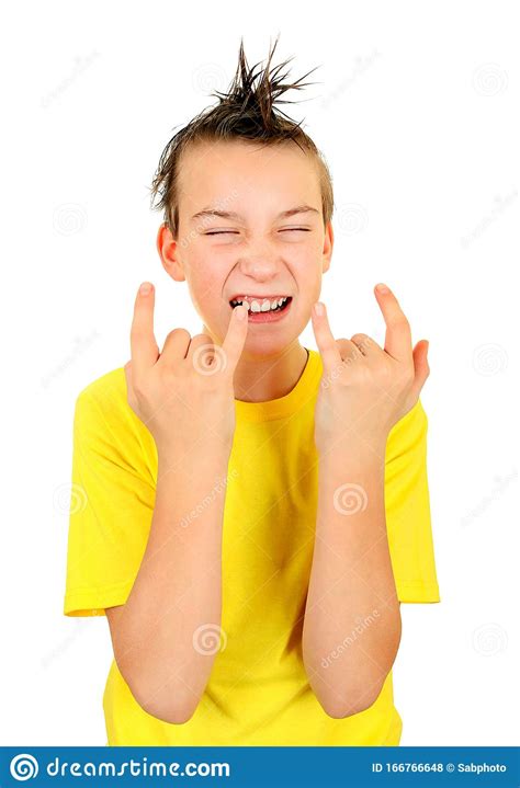 Menino Com Sinal Dos Cornos Foto De Stock Imagem De Excitamento Pessoa 166766648