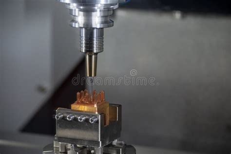 The Cnc Milling Machine Cutting The Copper Electrode Parts With Sloid Ball Endmill Stock Image