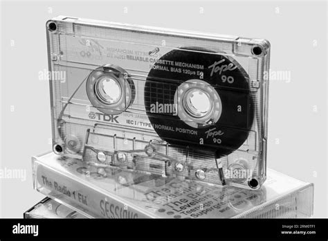 Monochrome Image Of The Clear Casing Of A Tdk Compact Cassette Shows The Intricate Internal