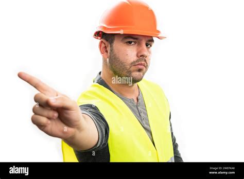 Serious Male Constructor Wearing Work Attire And Helmet Making Not