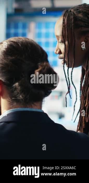 Vertical Video Photovoltaics Factory Manager Giving Tasks To Workers