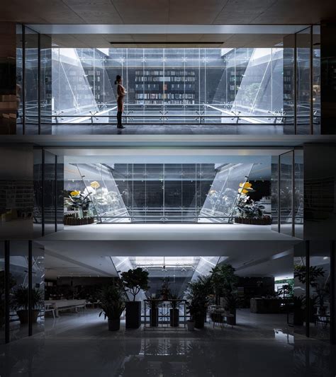 Wutopia Inserts Inverted Triangular Lightwell Into Book Shop