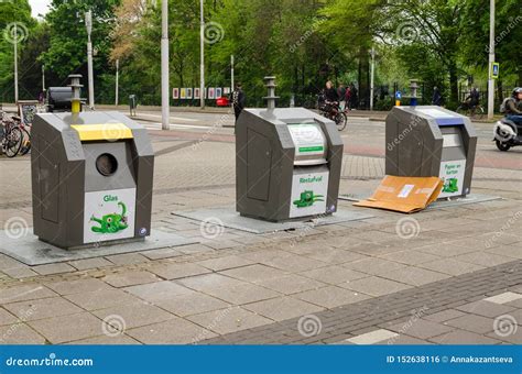 Three Garbage Containers For Separate Types Of Trash Royalty Free Stock Photography