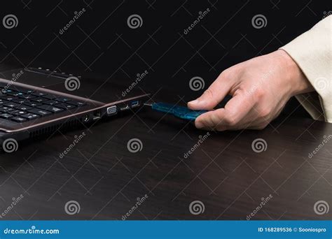 USB Memory Stick Flash Drive In Hand By Connecting It To A Laptop Stock Photo Image Of Disk