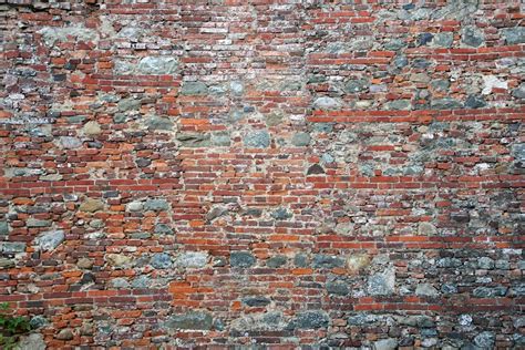 강한 거친 건물 건물 외관 건설 건축 구조 기초 낡은 단단한 도시의 돌 돌로 만든 물건 러스틱 모르타르 문화 유산 바위 배경 벽 벽돌