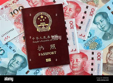 Red Passport Of People Republic Of China And Chinese Yuan Money Bills Prc Chinese Passport On