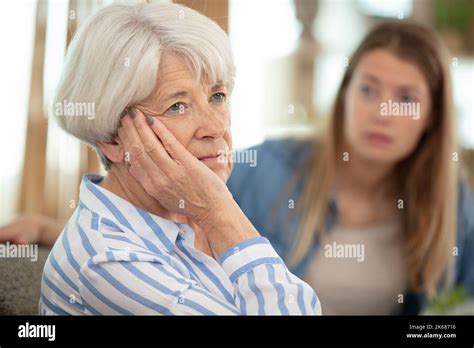Babe Comforting Upset Older Woman Having Problems Stock Photo Alamy
