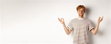 Free Photo Calm And Relaxed Young Man With Red Messy Hair Spread