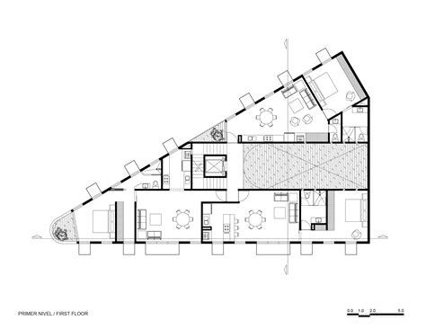 Hgr Arquitectos Reinforces Triangular Housing Against Seismic Activity Residential Building