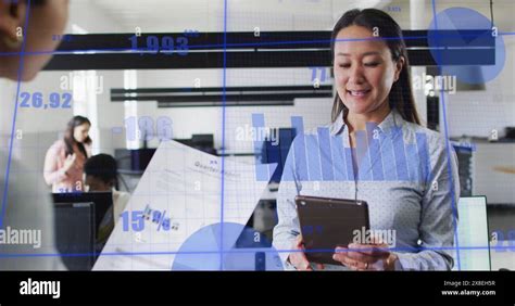 Image Of Statistical Data Processing Against Asian Woman Discussing