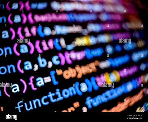 Closeup View Of Software Code On A Computer Screen With Blurred