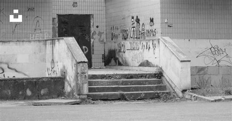A Person Is Visible In A Circular Window Photo Free Abandoned Image