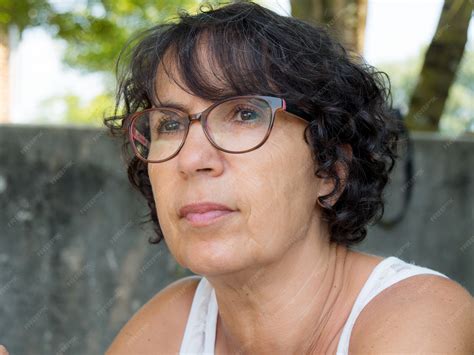 Premium Photo Portrait Of A Mature Woman With Glasses