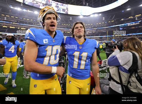 Los Angeles Chargers Quarterback Justin Herbert Left Hugs Place
