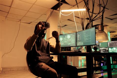 Hacker Programming Virus In Vr Helmet Hacking Computer System Stock