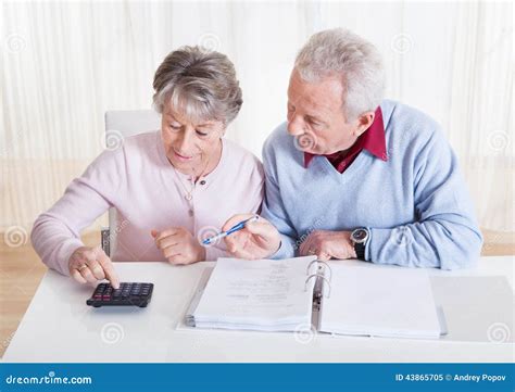 Senior Couple Calculating Budget Stock Image Image Of Discussing Female 43865705