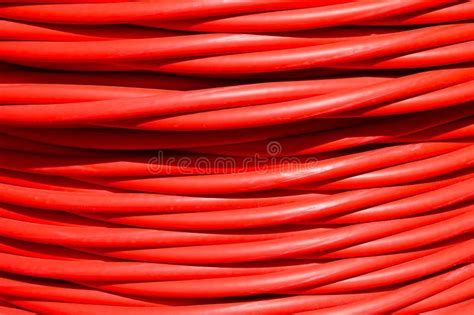Red Cable Used For High Voltage Power Transmission From A Power Plant
