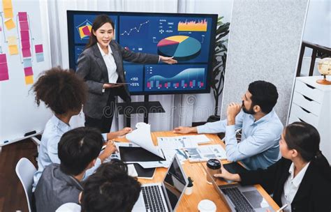 Young Asian Businesswoman Presenting Data Analysis Dashboard On Tv Concord Stock Image Image