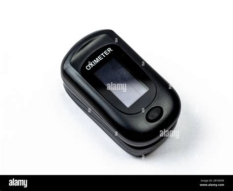 Digital Pulse Oximeter Photographed On A White Background In High Key