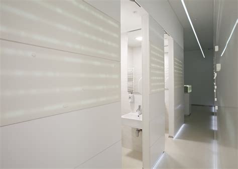 Fluid Architecture Adds Secret Doors Inside Serbian Clinic