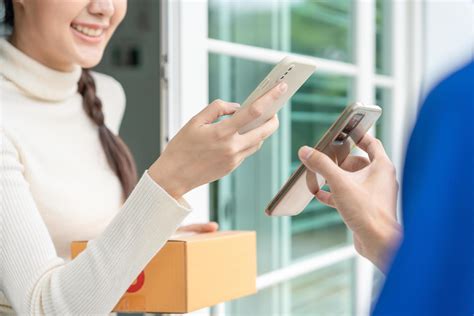 Happy Smile Asian Woman Scan QR Code For Pay Of Food Delivery Man Send Deliver Express Online