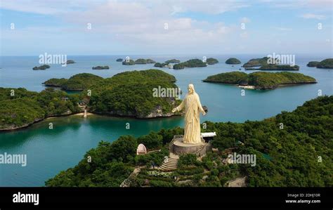 Aerial View Of The Hundred Islands National Park And The Statue Of