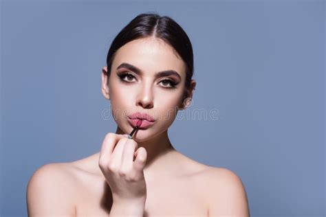 Gorgeous Young Woman In Stylish Makeup Girl Posing With New Lipstick