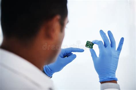 Technology Hardware And Man In Lab With Microchip For Motherboard Maintenance Repair Or