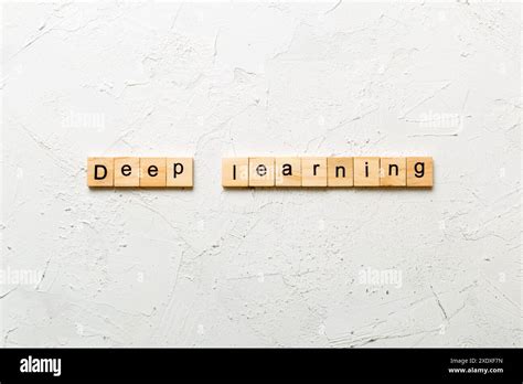 Deep Learning Word Written On Wood Block Deep Learning Text On Cement