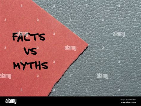 Facts Vs Myths Words Written On Red Torn Paper Piece With Gray