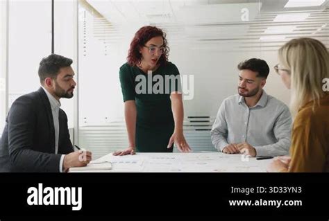 Serious Female Product Manager Man Presenting Analytic Reports To