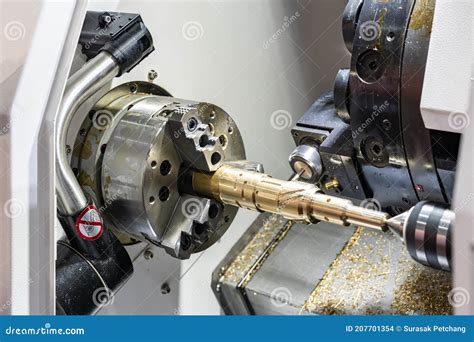 metal brass workpiece set on spindle chuck of automatic high precision