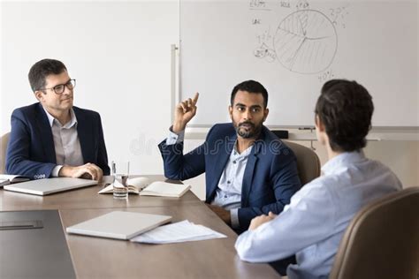 Team Leader Explaining Sales Data Or Financial Performance During