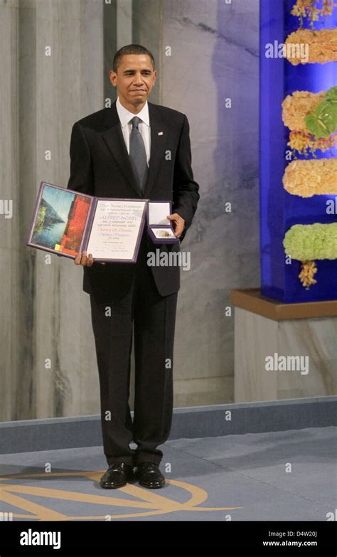 The 2009 Nobel Peace Prize Laureate Us President Barack Obama Poses