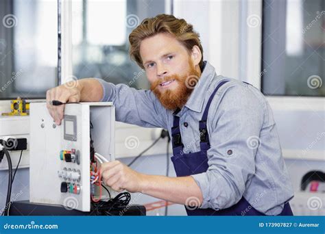 Man Works With Electronic Components In Factory Stock Image Image Of Electronic Electrical