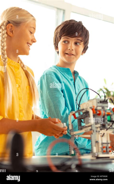Babe And Girl Discussing Their Science Project Stock Photo Alamy