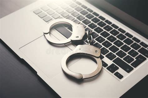 Handcuffs On The Laptop Cyber Crime Concept Stock Image Image Of