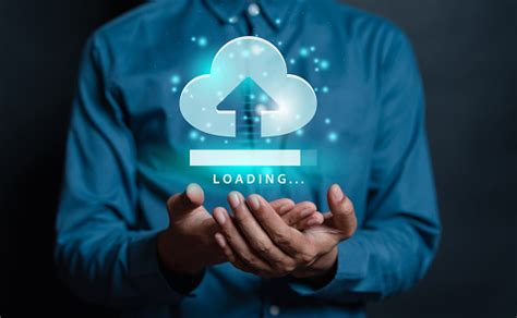 Businessman Holding Virtual Glowing Cloud Computing To Download And Loading Data Information And