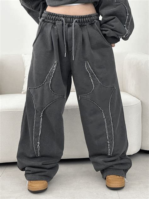 Unisex소장추천 피기 워싱 피그먼트 블링 스타 패치 유니크 더 힙 루즈 핀턱 트레이닝 팬츠2color 에이블리