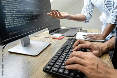 Programmer Team Of Developing Programming And Website Working In A Software Develop Company