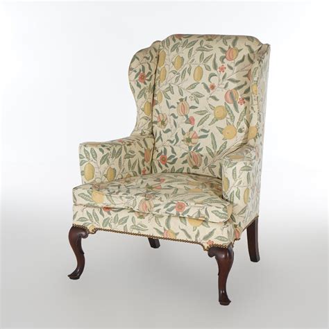 English Queen Anne Style Upholstered And Mahogany Fireside Wingback