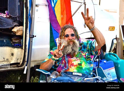 Hippies Holding Signs