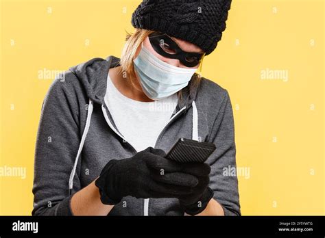 Female Hacker In Black Mask Hi Res Stock Photography And Images Alamy