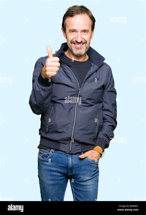 Middle Age Handsome Man Wearing A Jacket Doing Happy Thumbs Up Gesture
