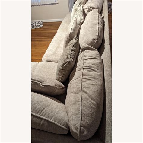 Ashley Rawcliffe 3 Piece Sectional Aptdeco