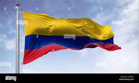 Colombia National Flag Waving In The Wind On A Clear Day Horizontal