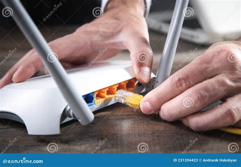 Man Plugging Internet Cable Into Wifi Router Stock Image Image Of Connection Signal